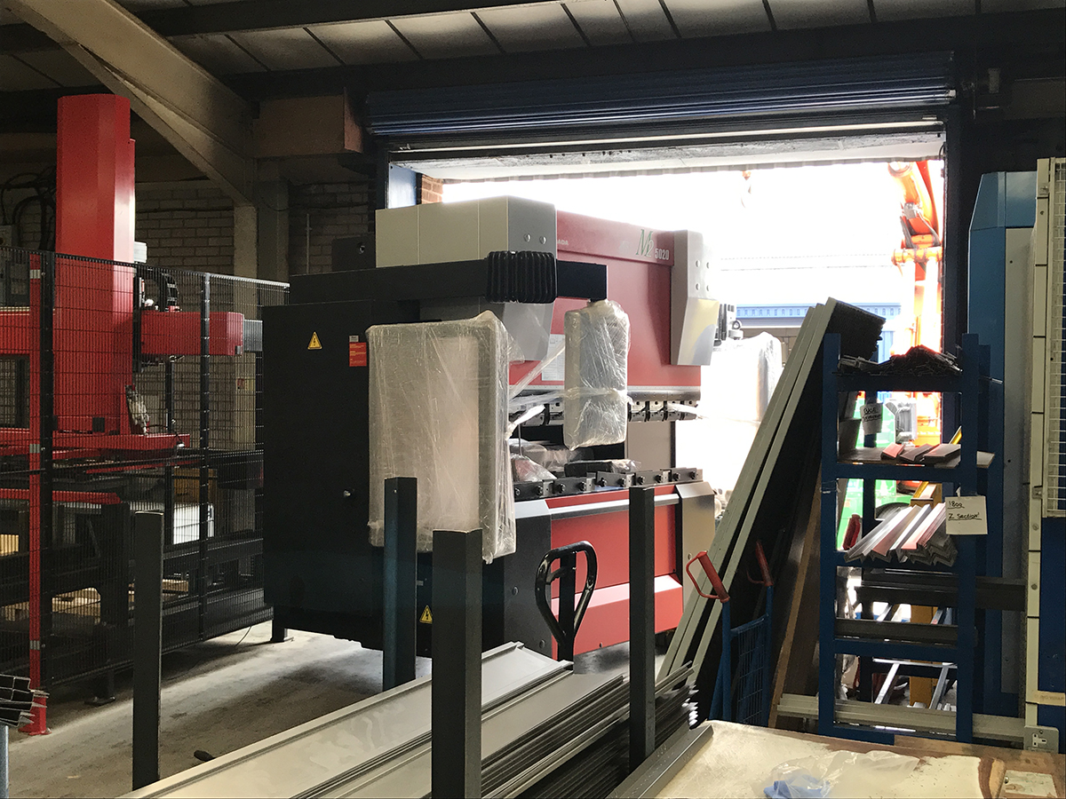 Installing our Amada Manual Bending Cell | Quality Metal Products Blog